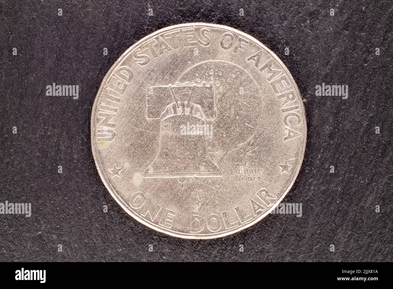 One silver dollar coin, close up, top view Stock Photo - Alamy