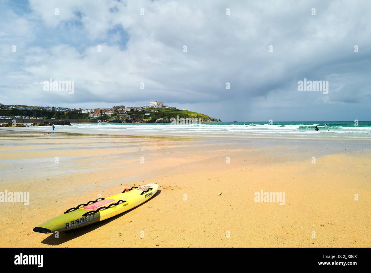 Lifeguard's surf board on the Great Western beach at Newquay, Cornwall ...