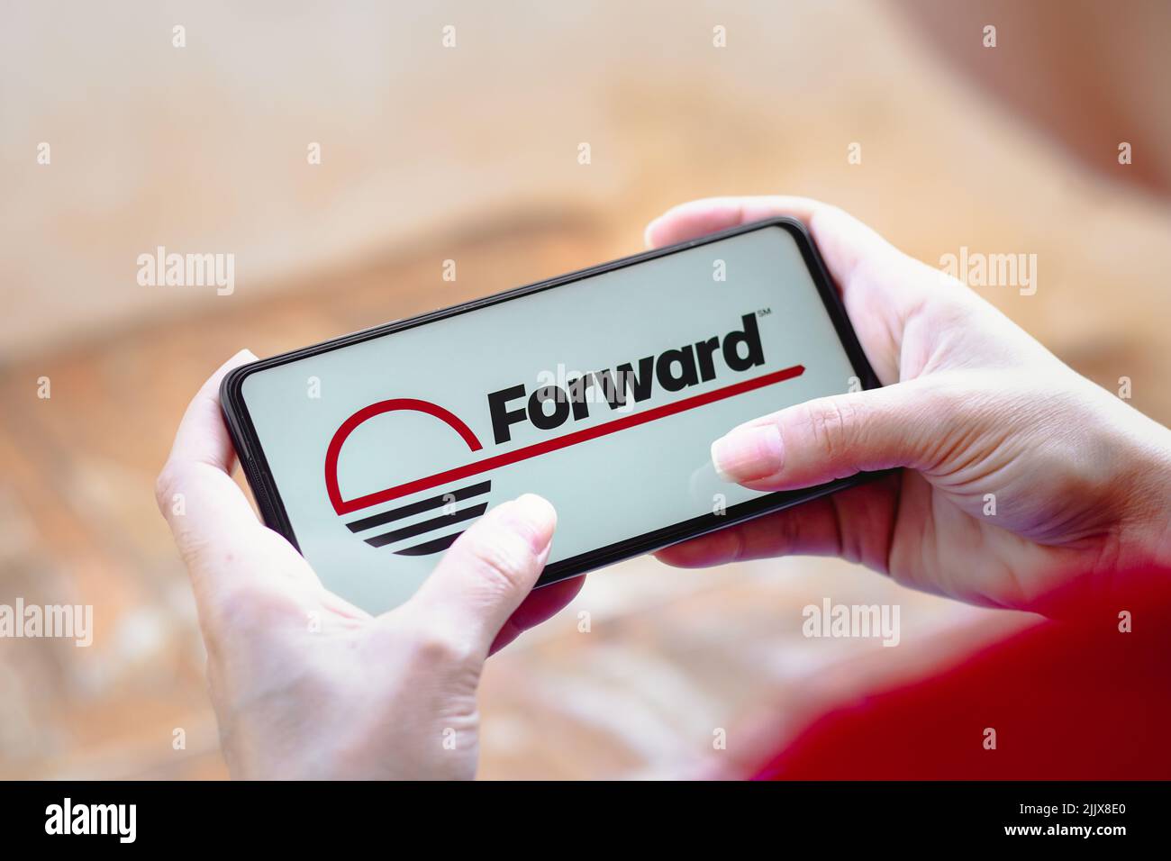 In this photo illustration, the Forward Air Corporation logo is ...