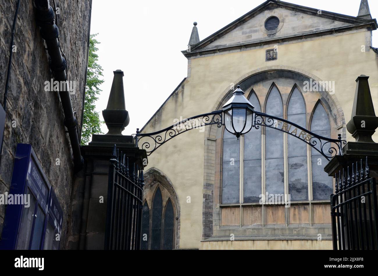 greyfriars church and cemetery with graves and stone skull and cross ...