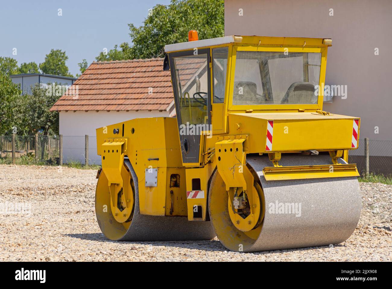 Yellow Compaction Tandem Roller Machinery at New Construction Site ...
