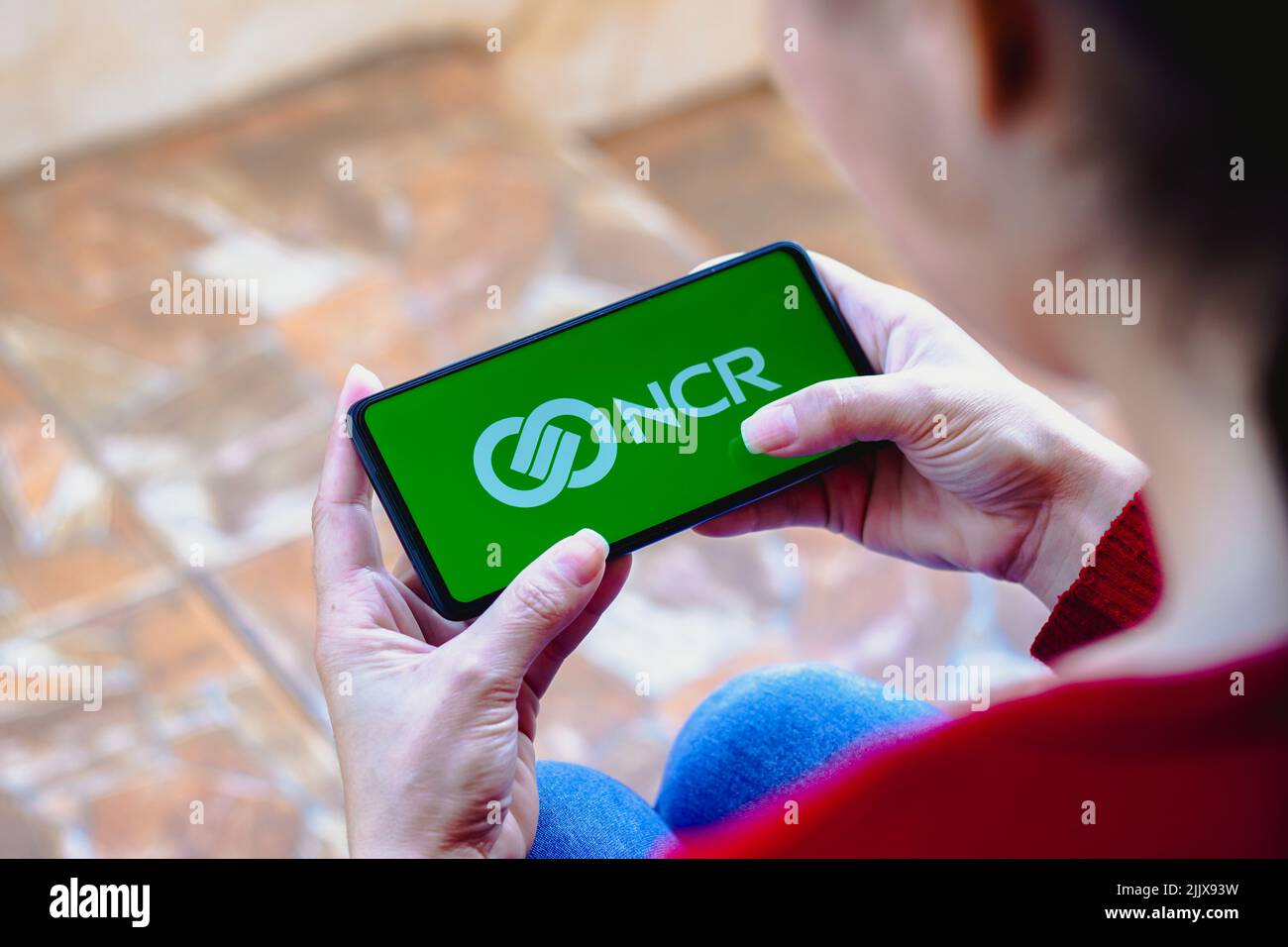 In this photo illustration, the NCR Corporation logo is displayed on a ...