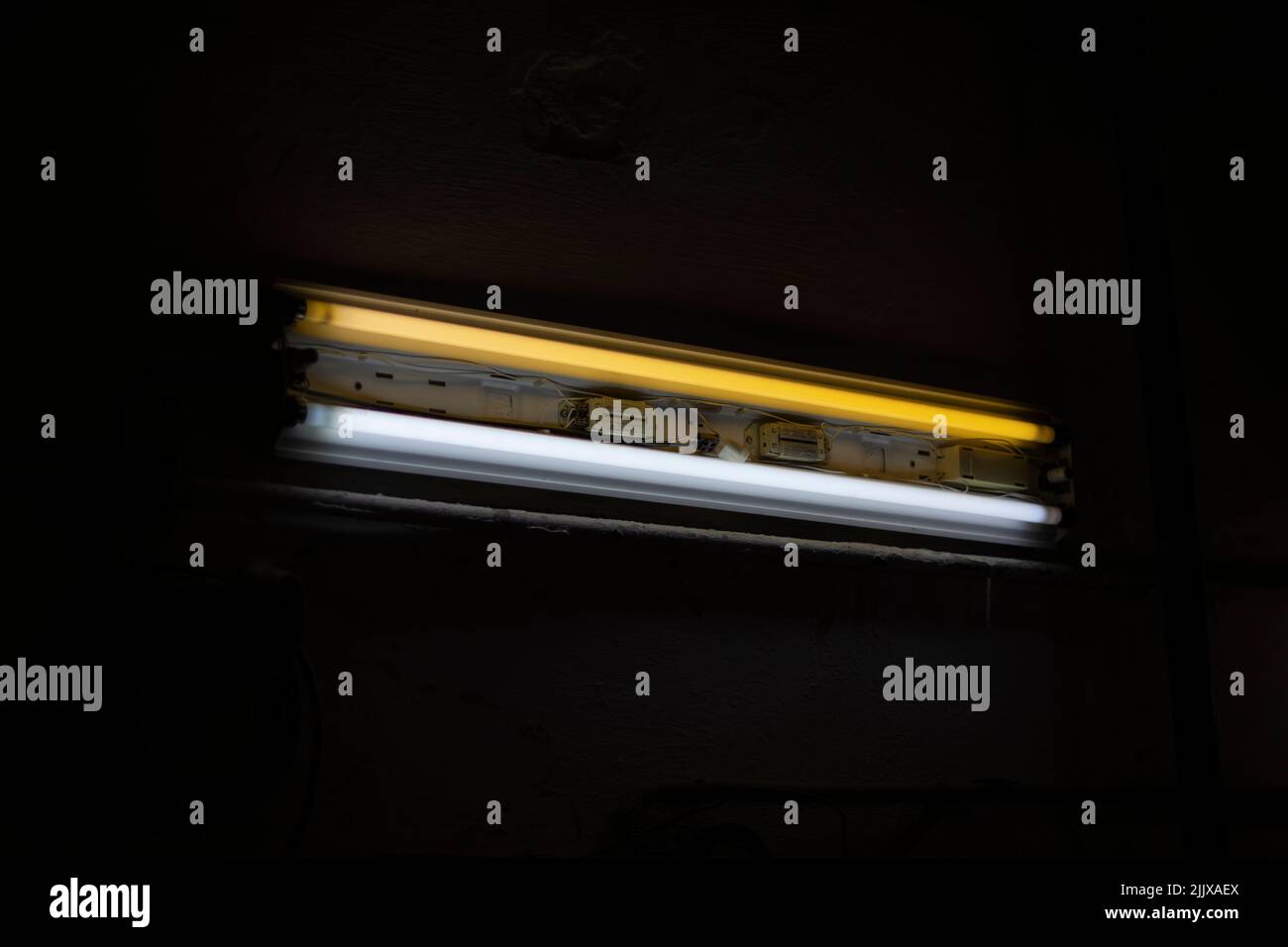 Fluorescent lamp in dark. Electric light. Lamps in interior Stock Photo ...