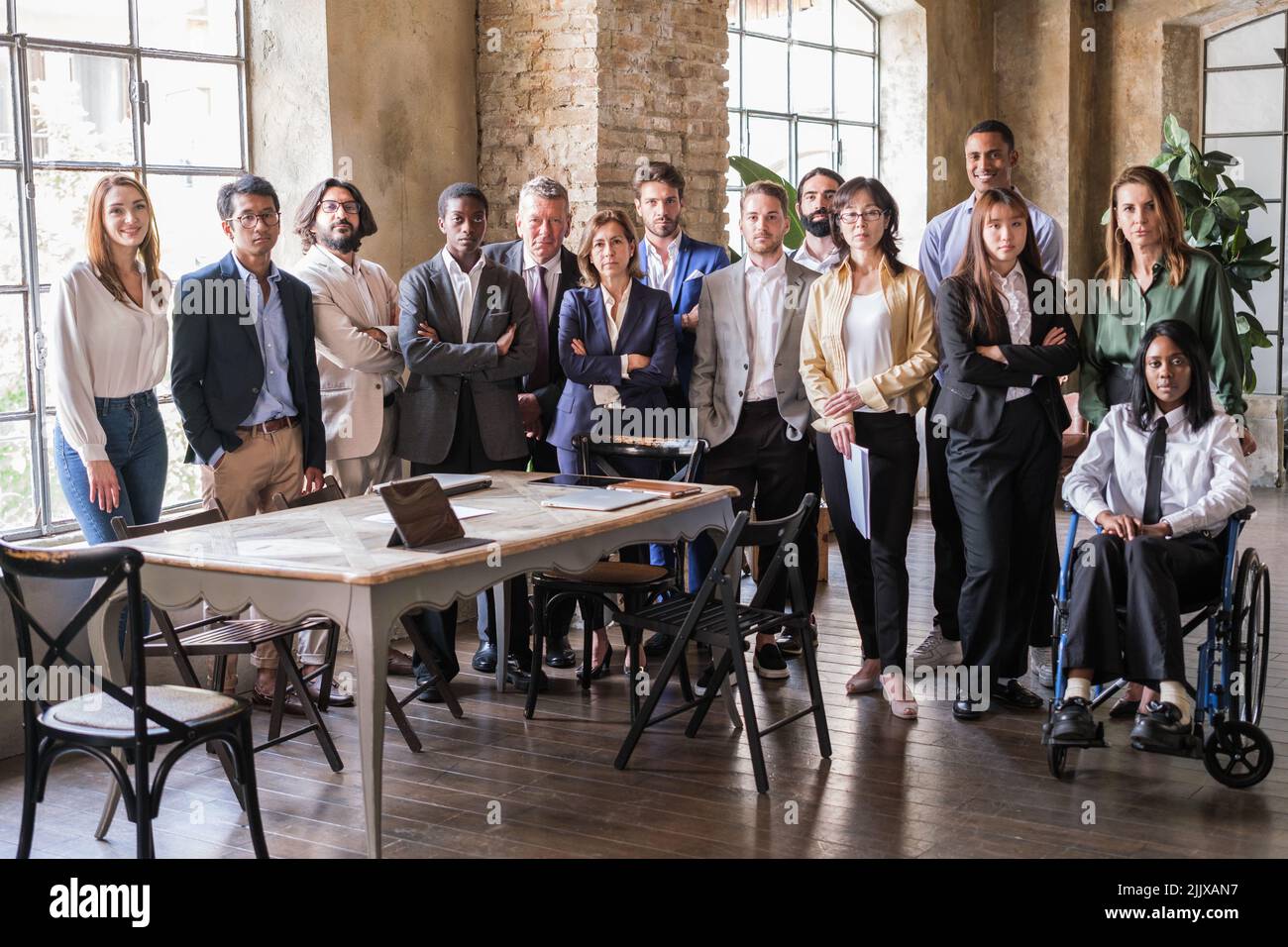 Group of multicultural businesspeople standing at team meeting Stock ...