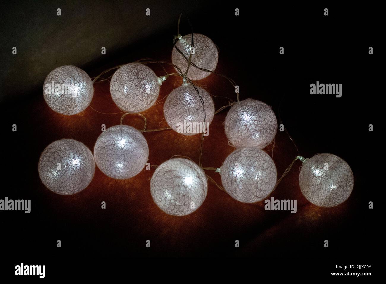Luminous balls for decoration. Garlands glow in dark. Transparent ...