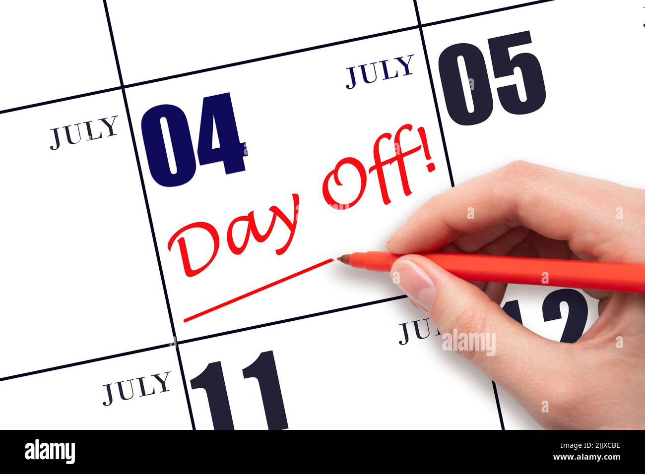 4th day of July. Hand writing text DAY OFF and drawing a line on ...