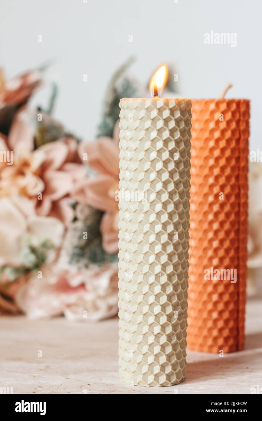 Wax decorative candles. Honeycomb candles. Multi-colored tall candles ...