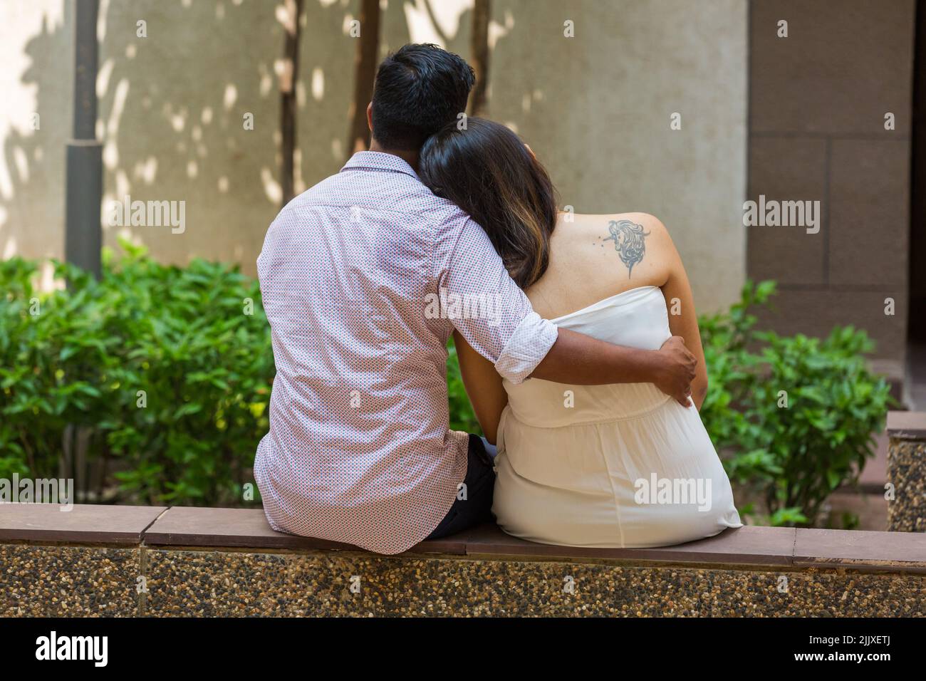 A rear view of a loving couple Stock Photo - Alamy