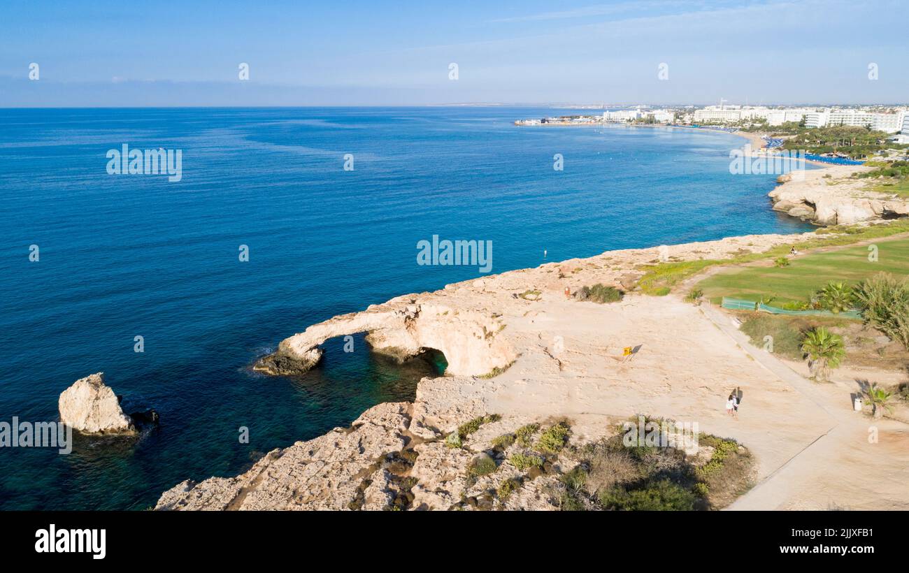 Aerial view of coastline and landmark Love bridge and sea caves, at ...