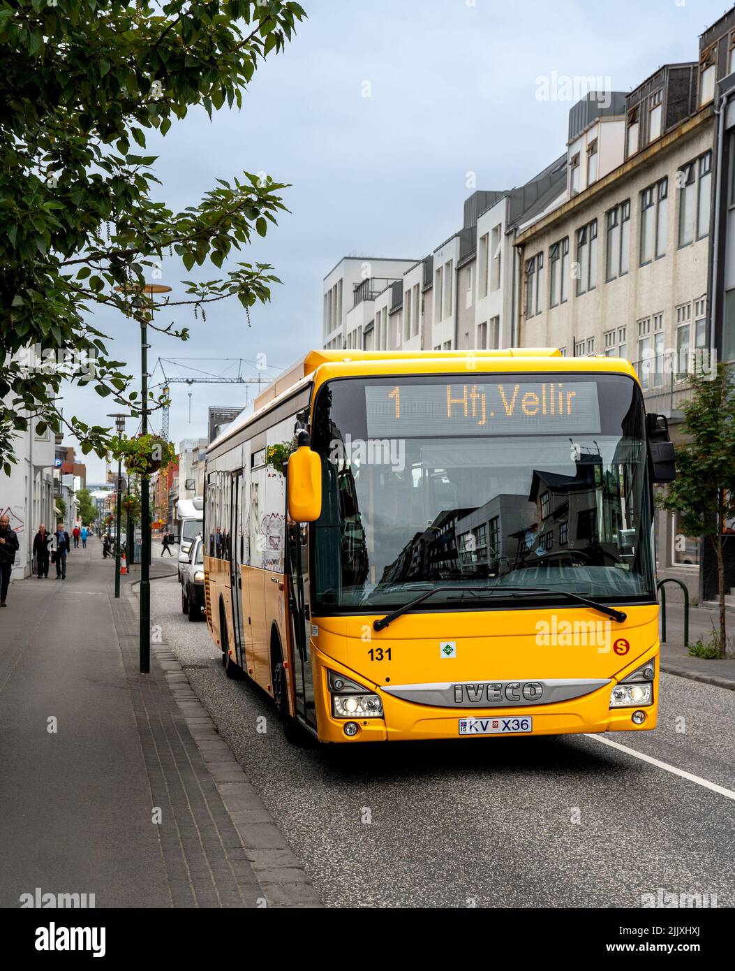 Reykjavík, Iceland - July 5, 2022 A view ofa Strætó. The bright yellow ...