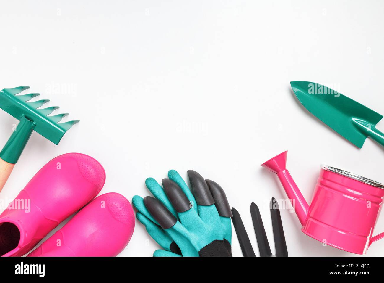 Garden tools on a white background. The concept of spring planting and ...