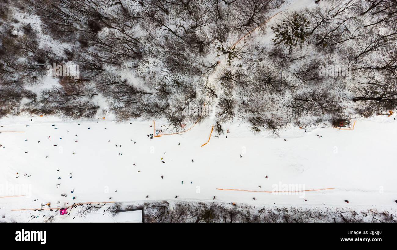 Drone view at slope on ski resort. Forest and ski slope from air ...