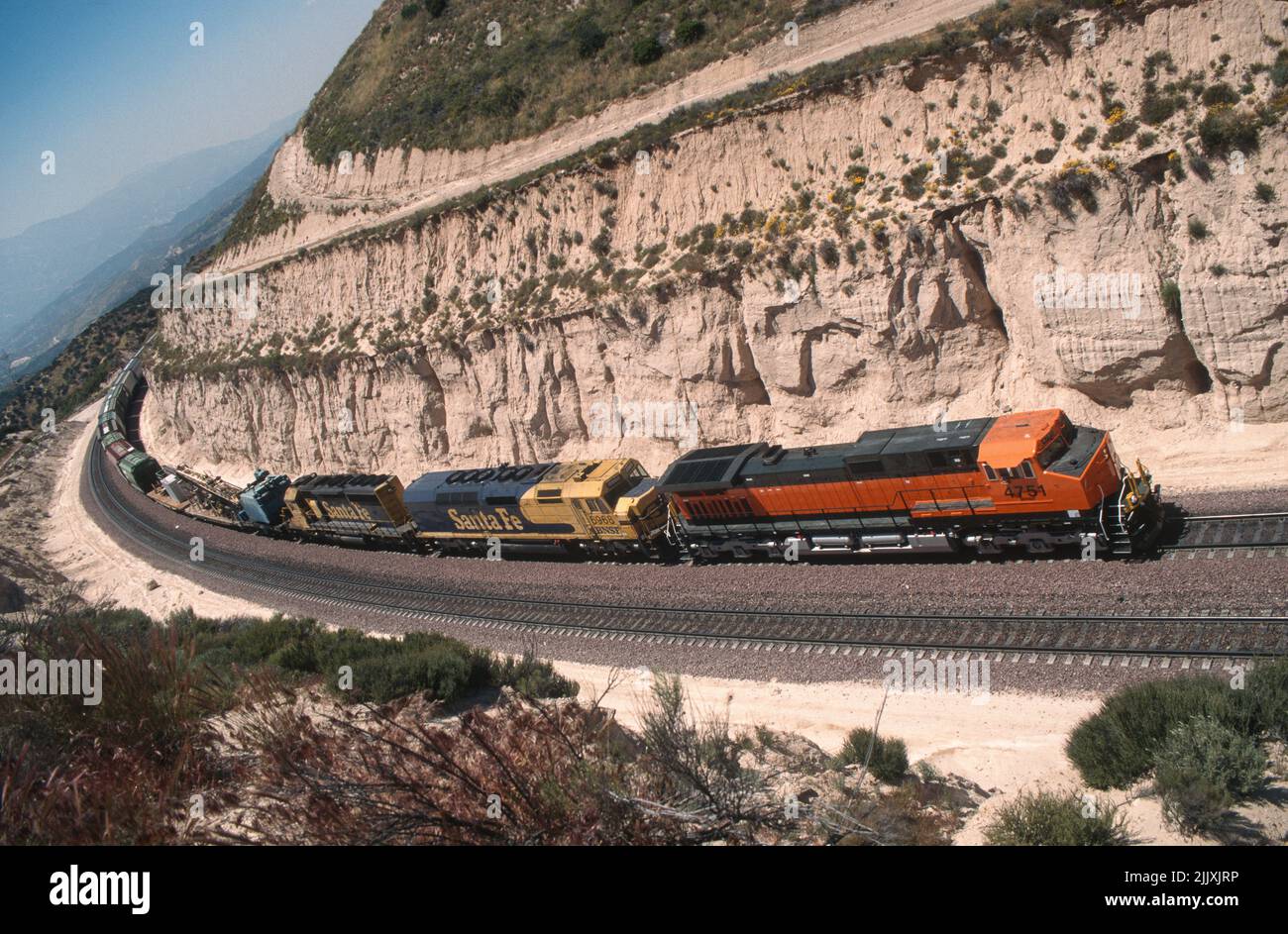 BNSF manifest train pulls through Summit on the Cajon pass Stock Photo - Alamy