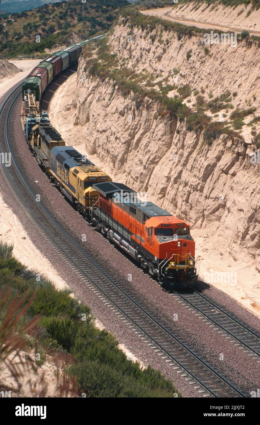 BNSF manifest train pulls through Summit on the Cajon pass Stock Photo - Alamy