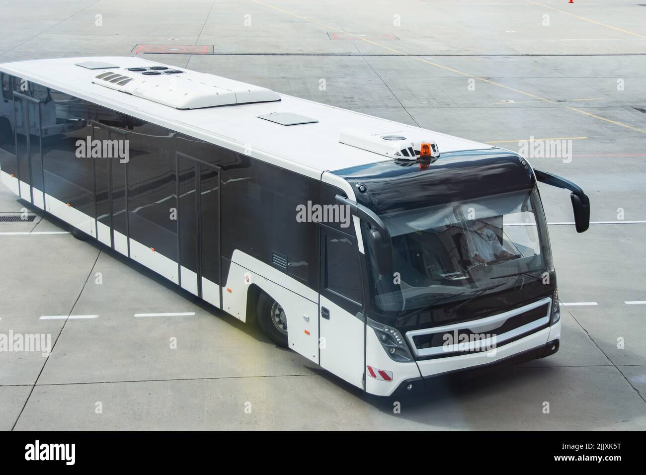 Bus in the parking lot for transporting passengers from the airport ...