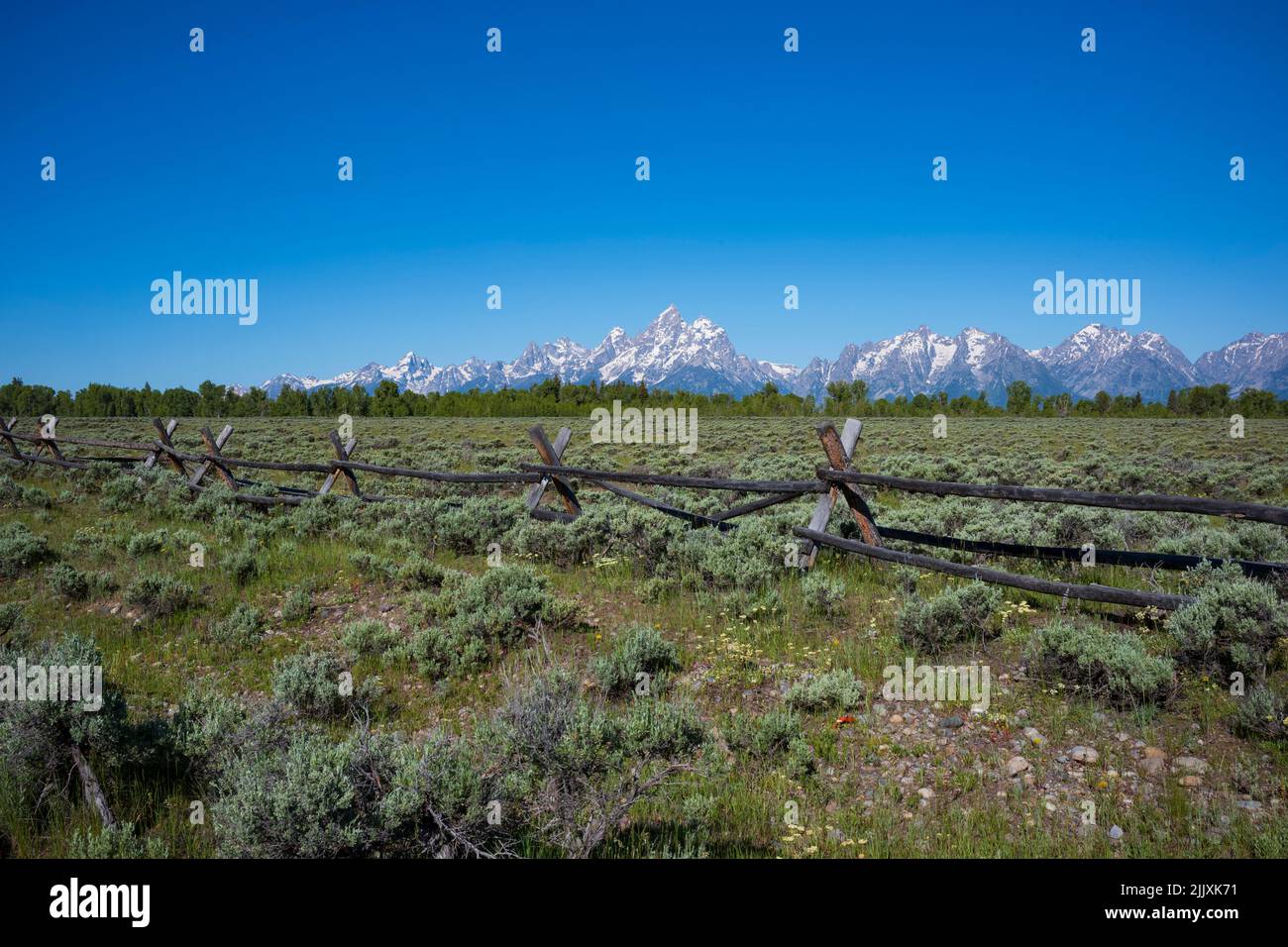 The mountain range of Grand Teton National Park is photographed during ...