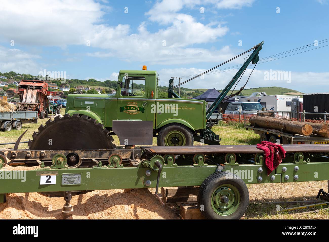 West Bay.Dorset.United Kingdom.June 12th 2022.A restored Unipower timber tractor is being shown ...