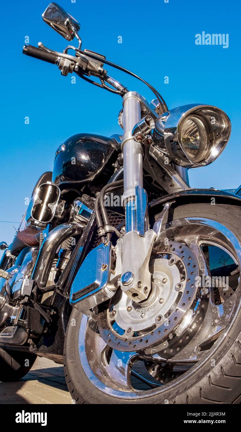 Old motorcycle view from below against the sky Stock Photo - Alamy
