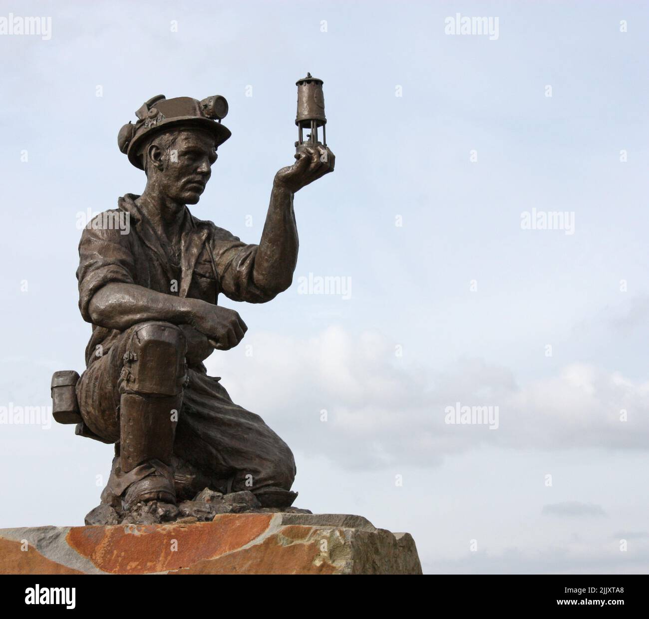 A Statue of a Coal Miner Testing for Gas Stock Photo - Alamy