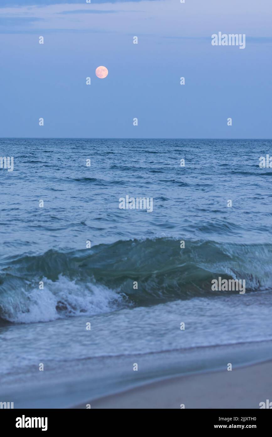 Full moon over Atlantic Ocean in Cape Cod, USA Stock Photo - Alamy