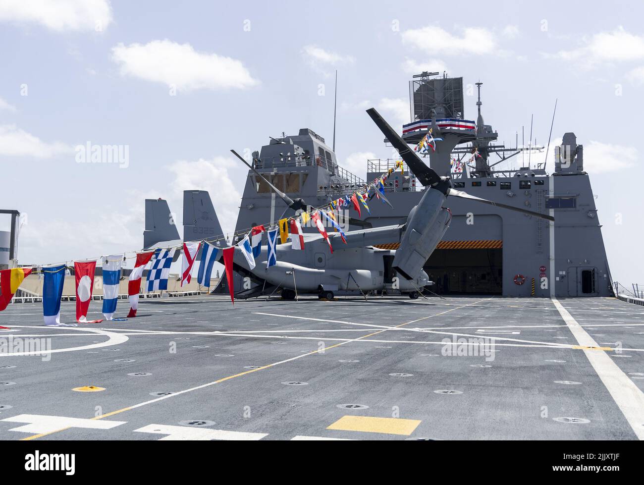 The press views a vertical take-off and landing aircraft (MV 22) deck 1 ...