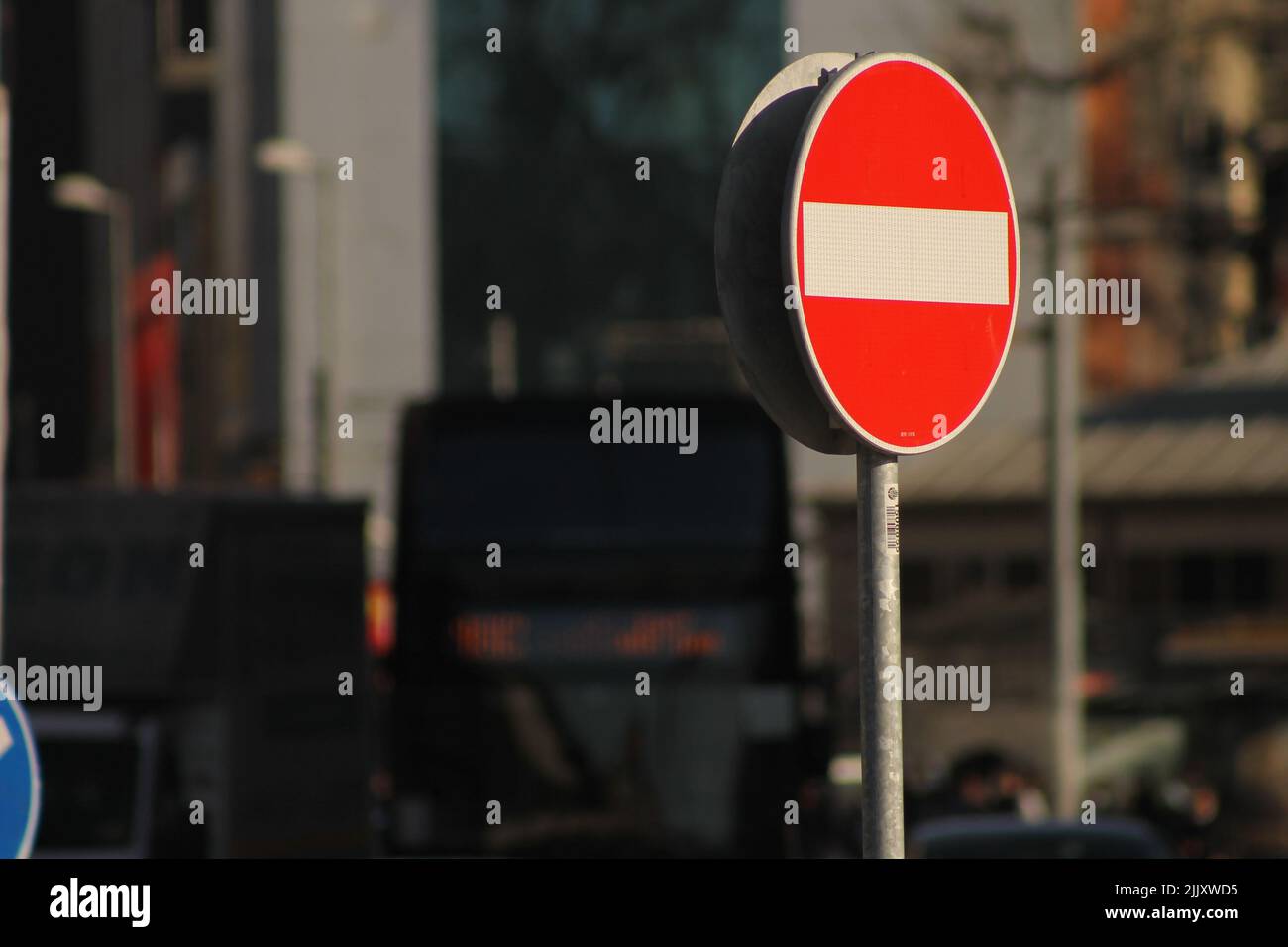 A red stop sign in the street Stock Photo - Alamy