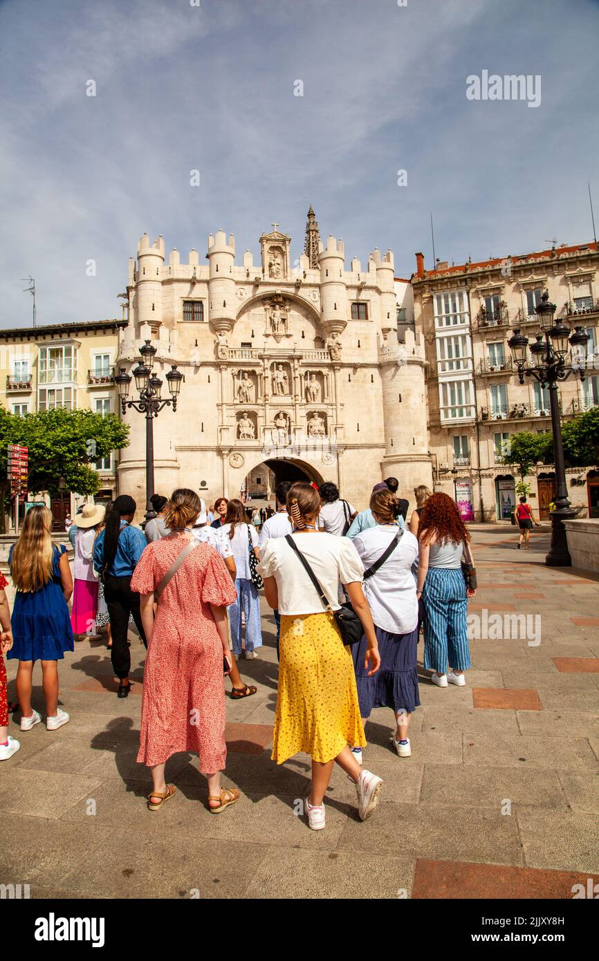 Tourists and sightseers on a guided tour of the Spanish city of Burgos ...