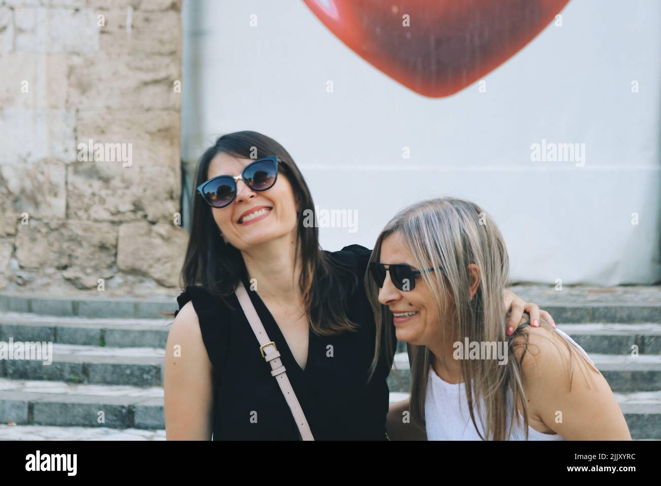 Two girls having fun Stock Photo - Alamy
