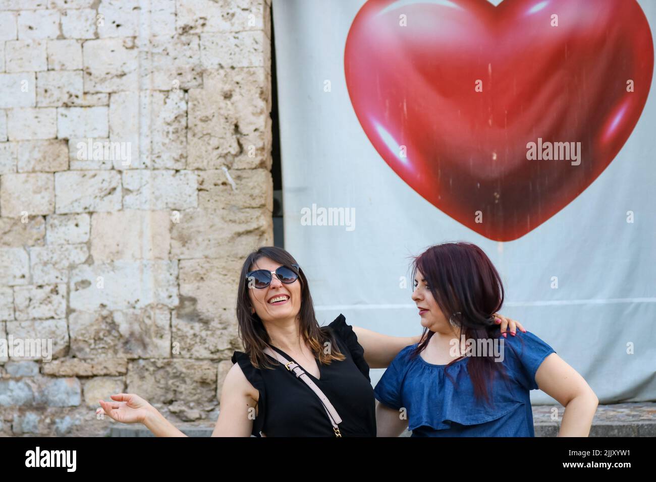 Two girls having fun Stock Photo - Alamy