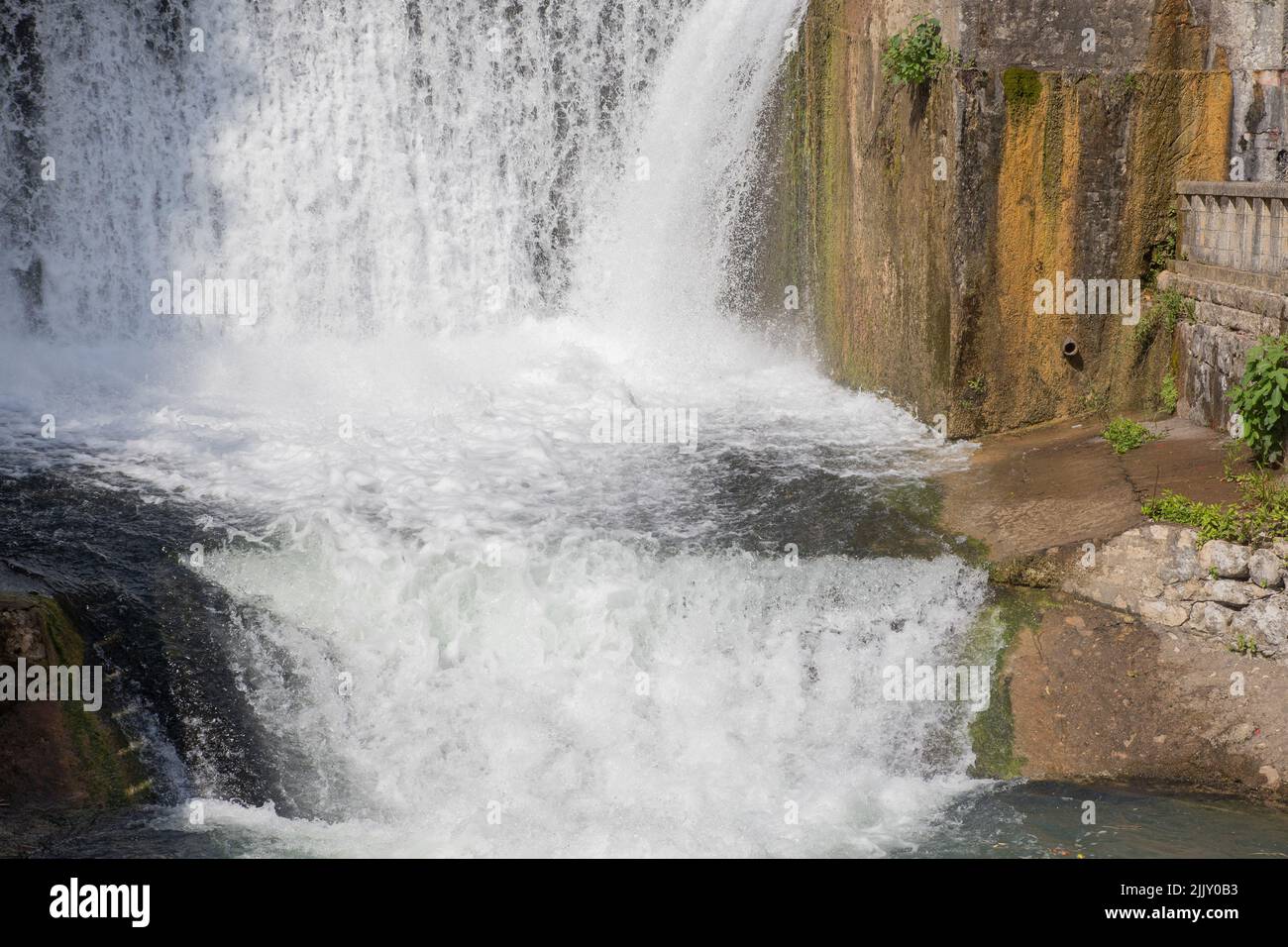 landscape of beautiful Artificial waterfall in garden at the public ...