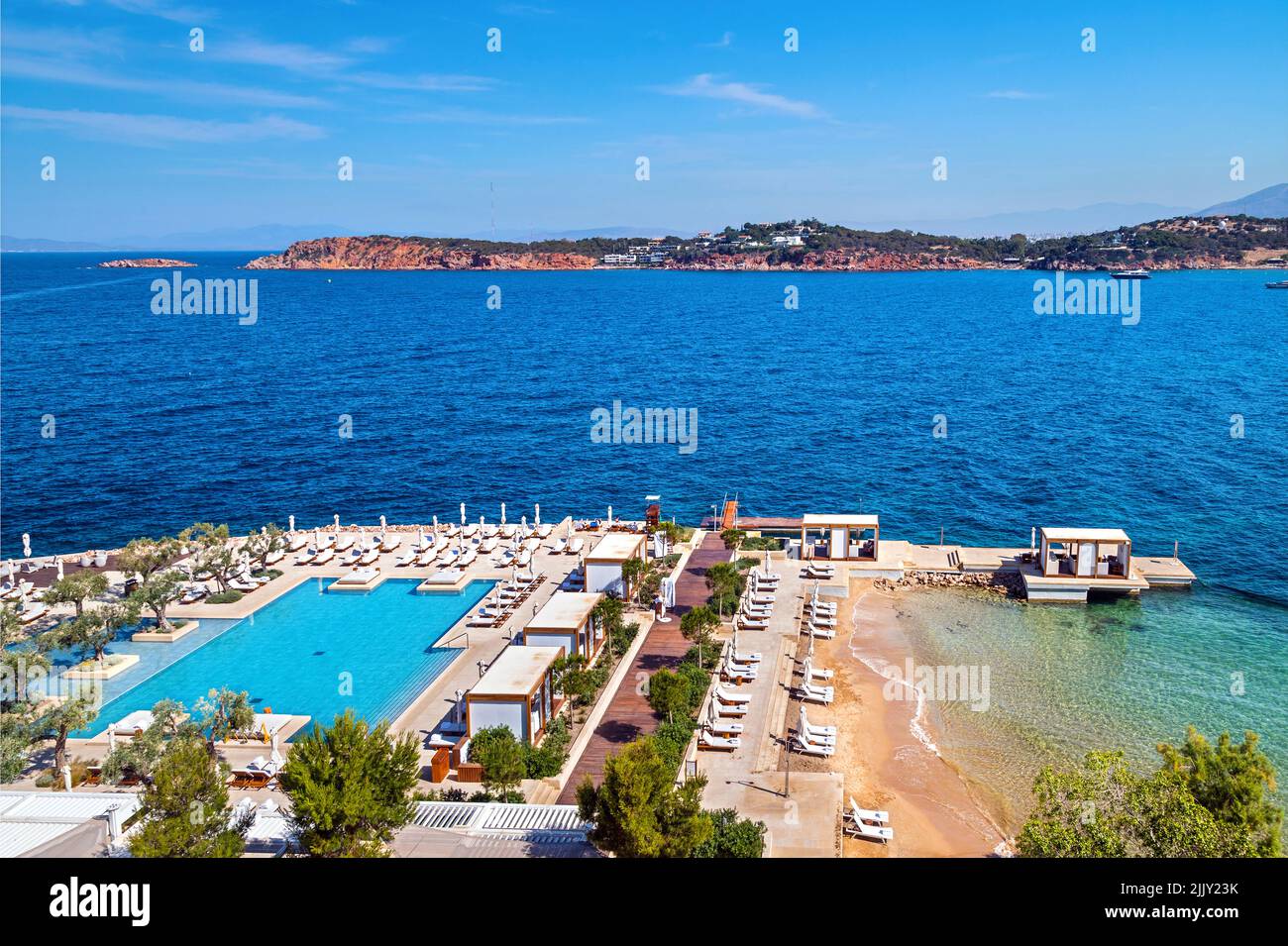 A pool and a beach in Four Seasons Astir Palace Hotel ( Vouliagmeni ...