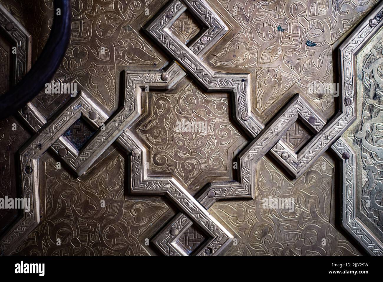 Iron door sculpture script detail on ancient Arabian gate close up ...