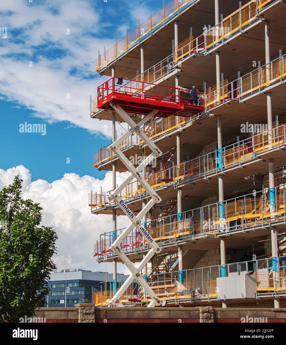 Vienna, Austria - 06.13.2022: Crane and construction site against blue ...