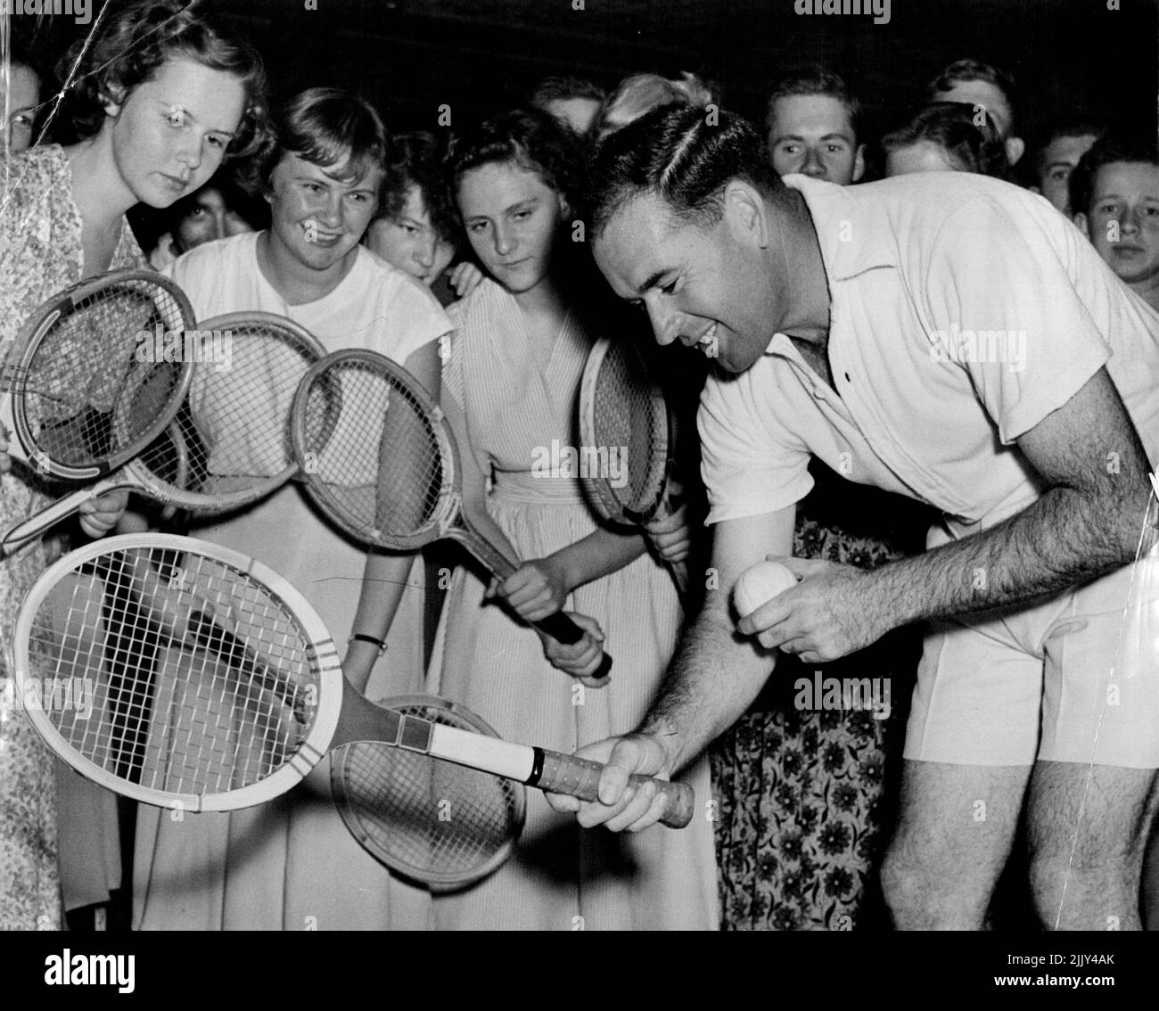 Dinny Pails demonstrates forehand 1 & Back hand volley 2 at a coaching ...
