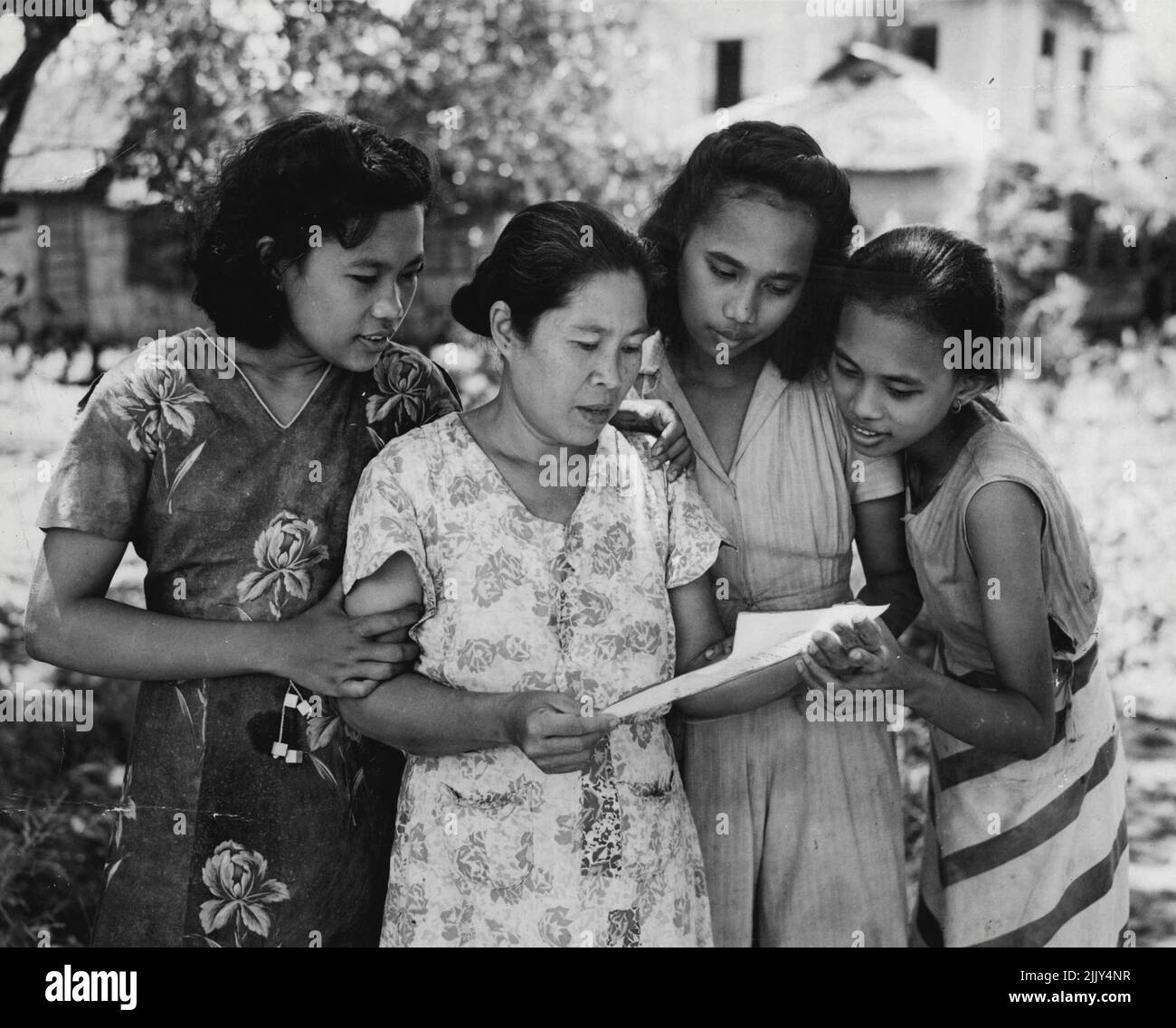 Message Of Liberation -- A Filipino mother and her daughters read a ...
