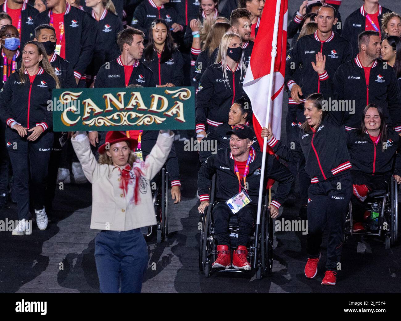 Flag bearers weightlifter Maude Charron, right., and wheelchair racer ...