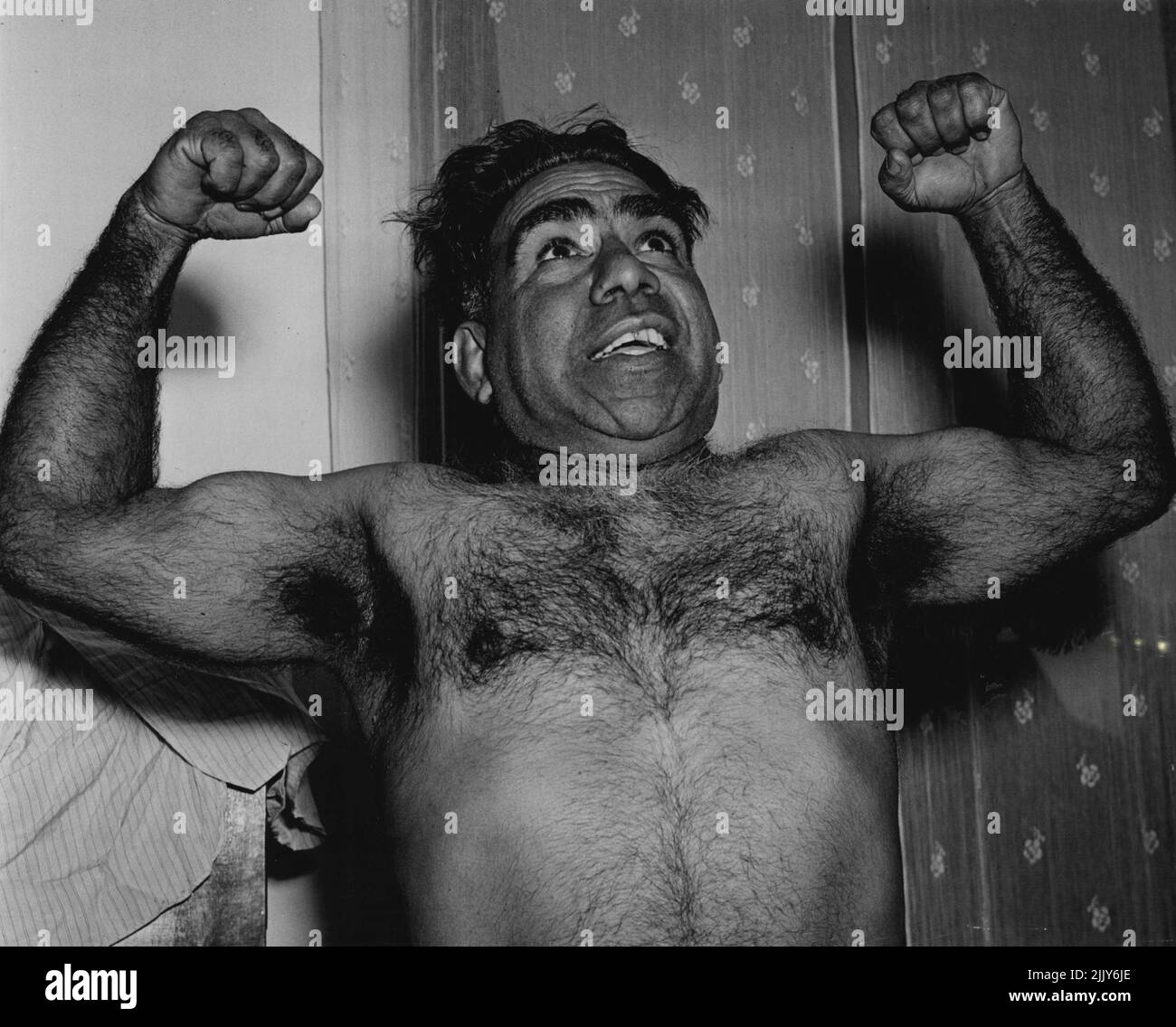 Barrel-like physique is Doug Nicholls' pride. Small he is only 5ft 2in ...