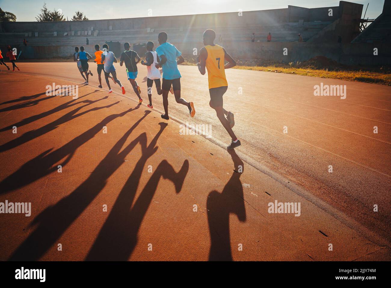 Kenyan marathon runners train at the athletics track in the town of ...