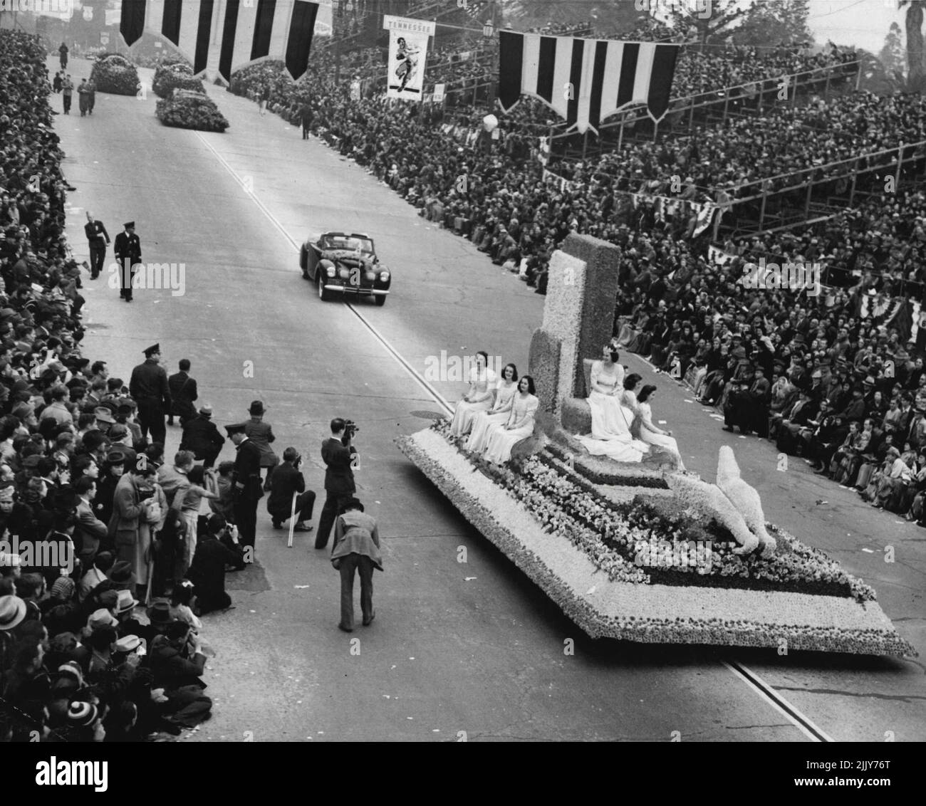 "The Rose Queen." On a modernistic throne of pastel blossoms, Margaret ...