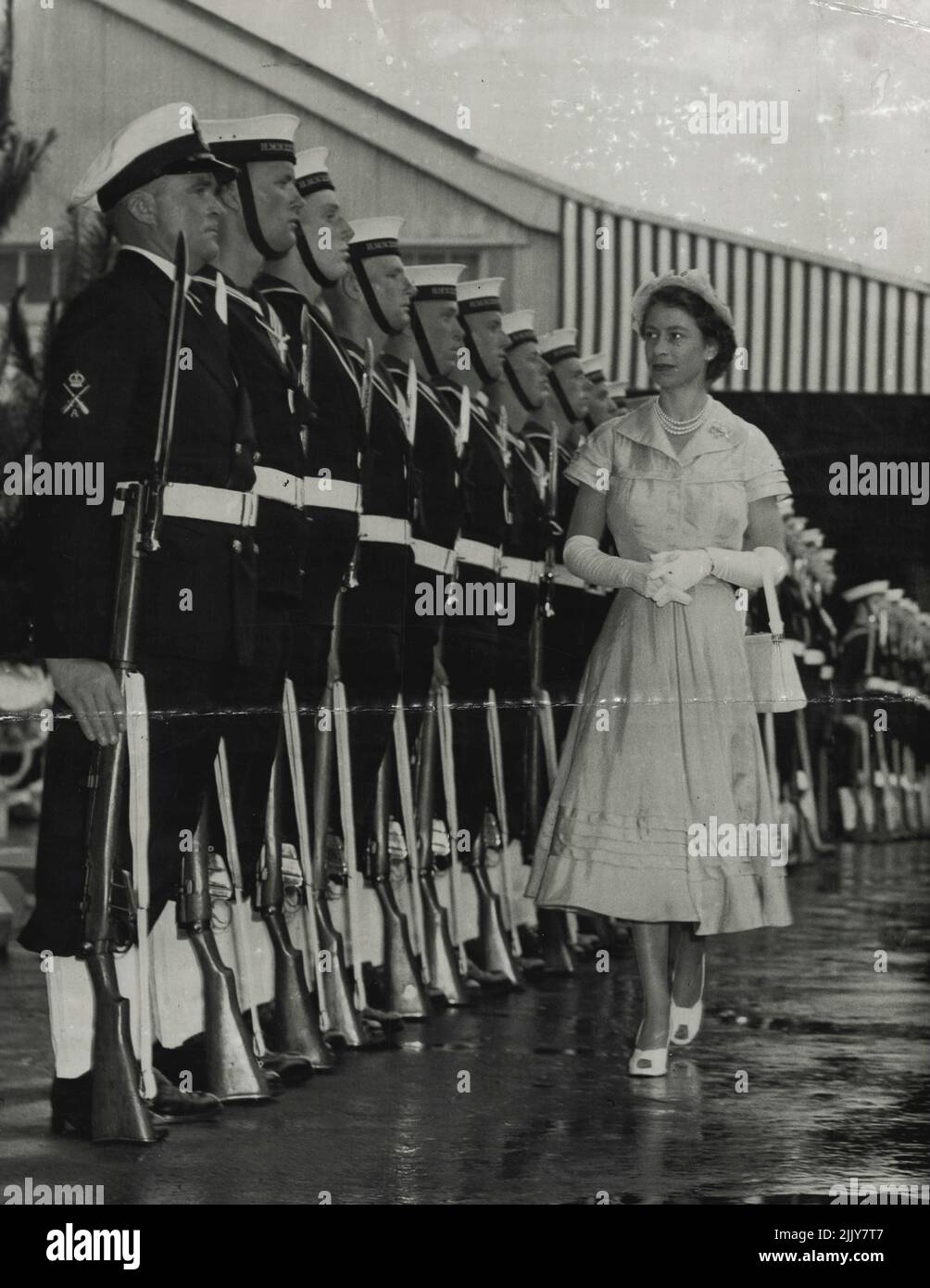Attention - The Queen has a satisfied smile as she inspects the naval ...