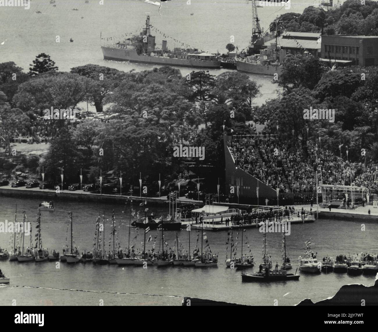 Officials and spectators wait tensely as the Royal approaches the ...