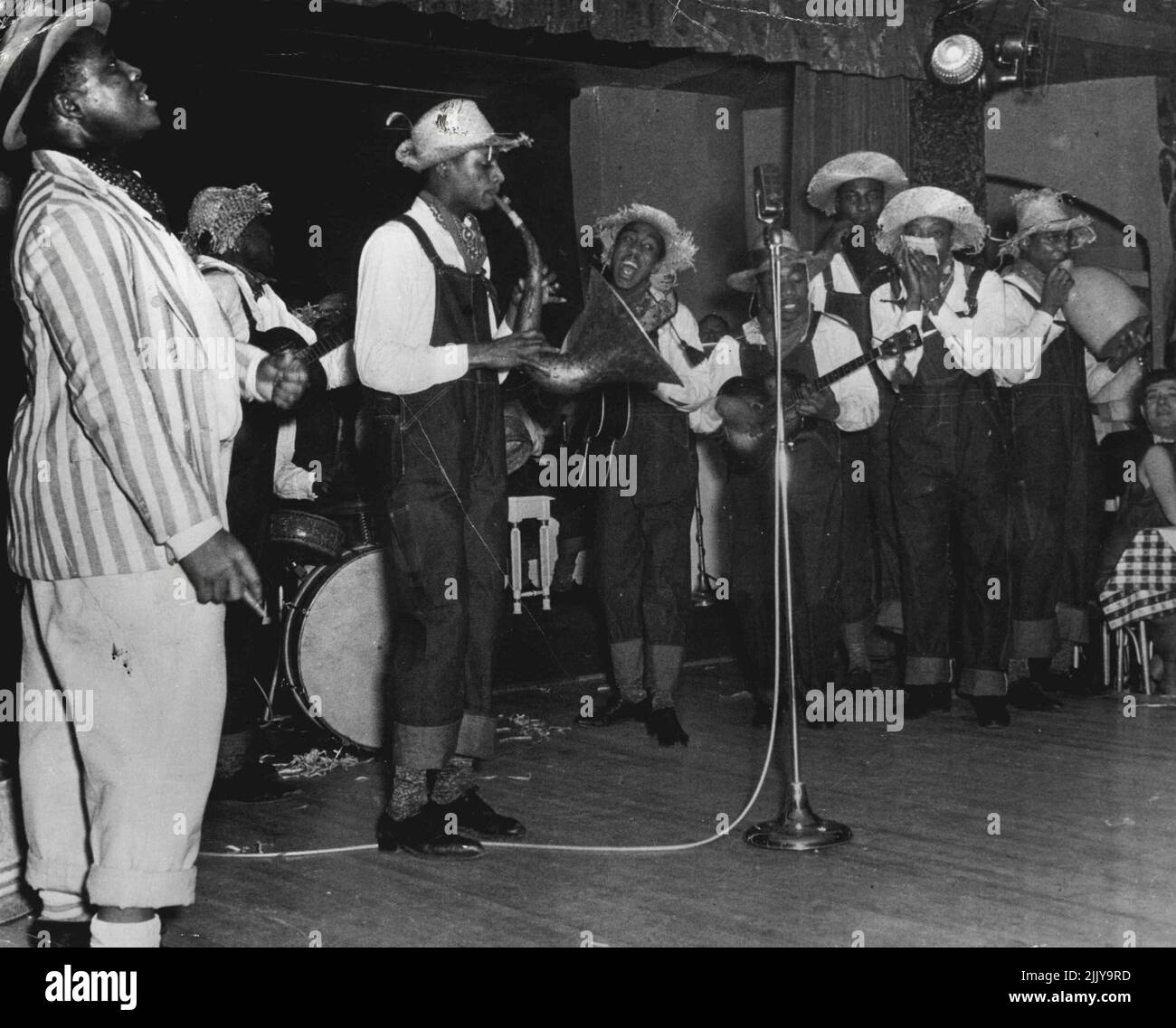 Night Life In Harlem -- Unusual Instruments and freak costumes are ...
