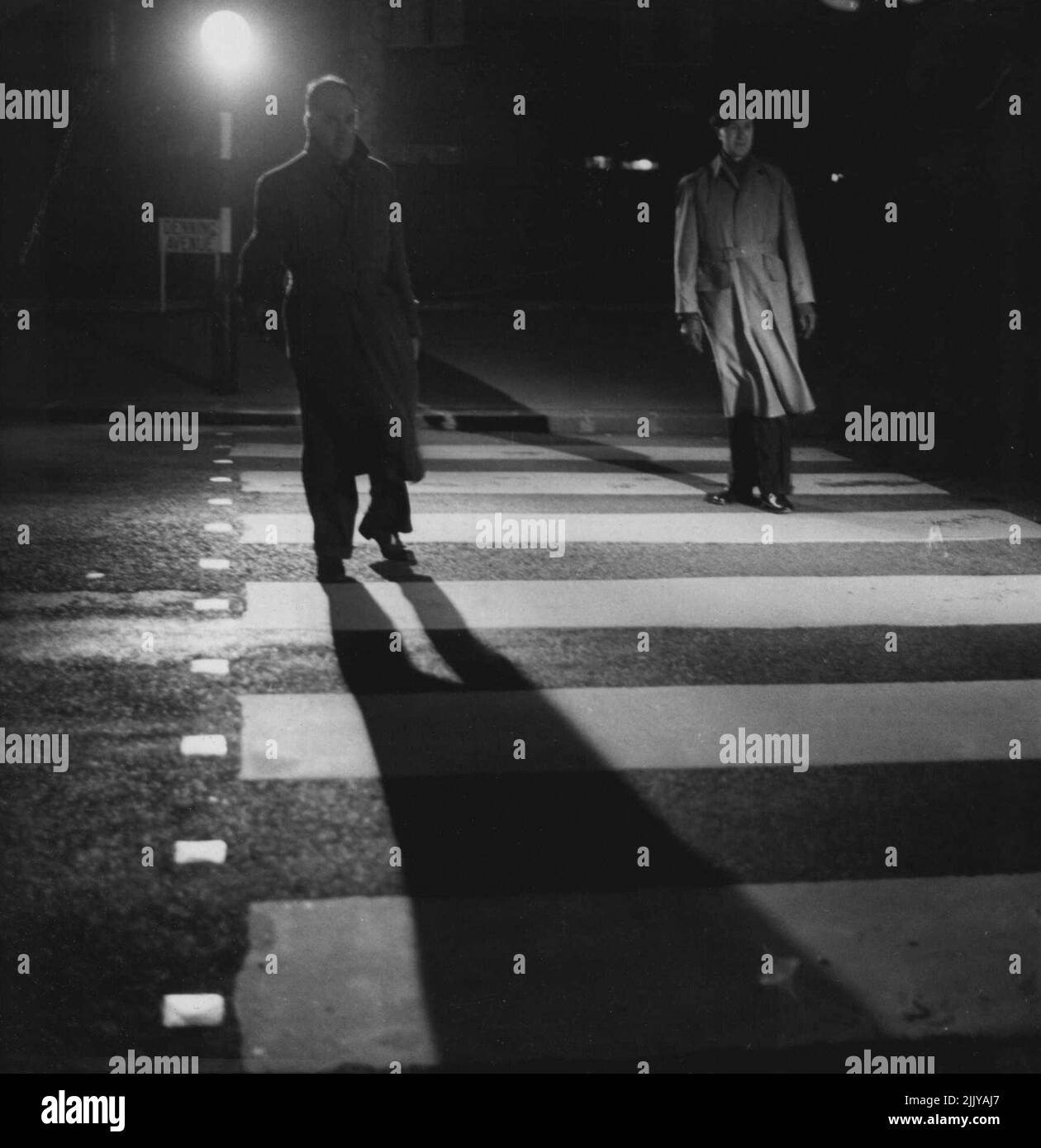 New British "Zebra" Illumination: Pedestrians crossing "Zebra" after it ...