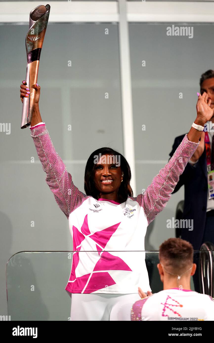 Denise Lewis OBE carries the baton during the opening ceremony of the ...