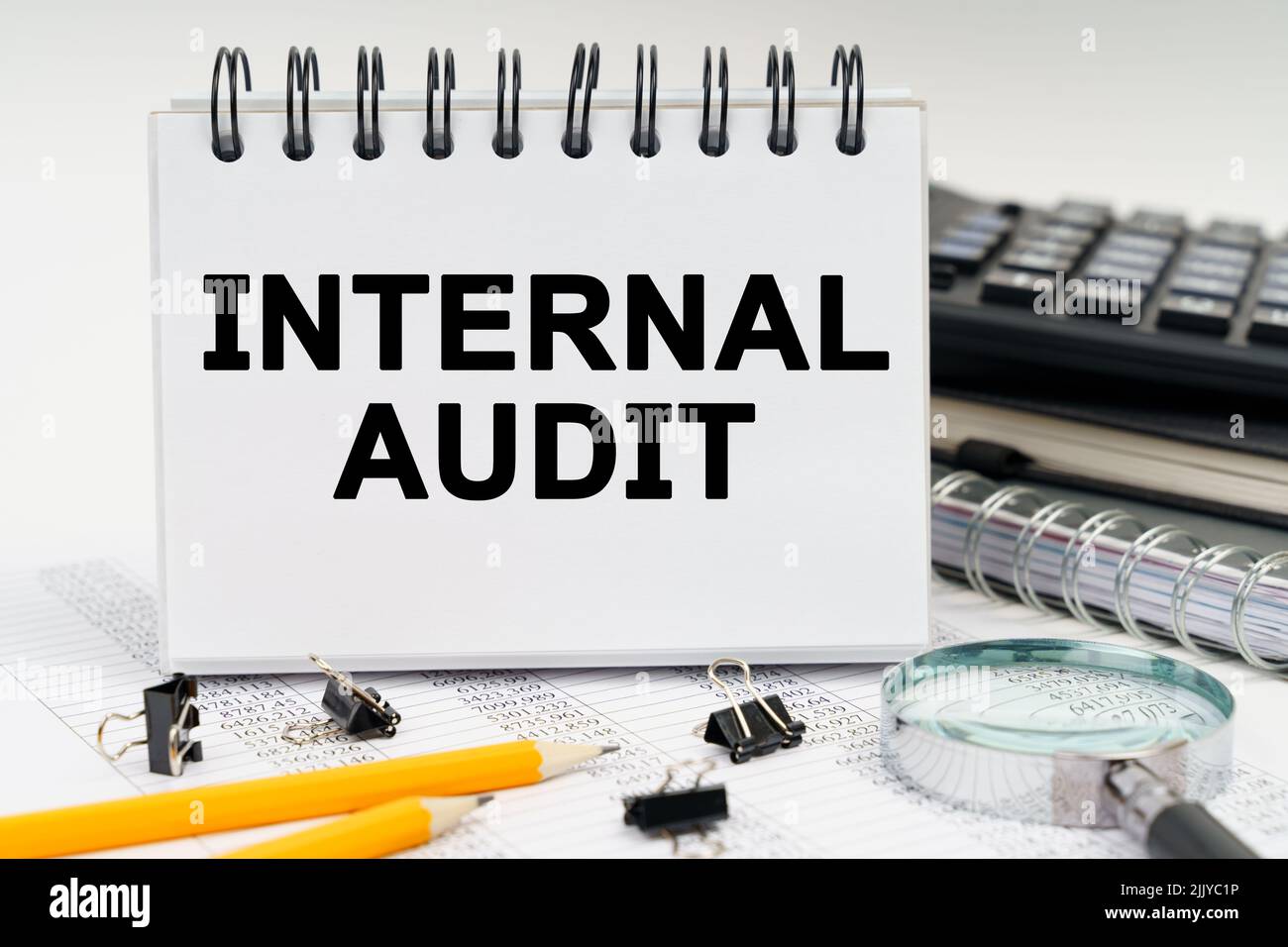 Business and economy concept. On the table is a magnifying glass ...