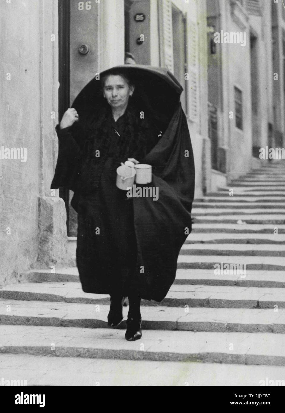 In Old World Valitta -- Maltese Woman wearing the Faldetta or "Hood of ...