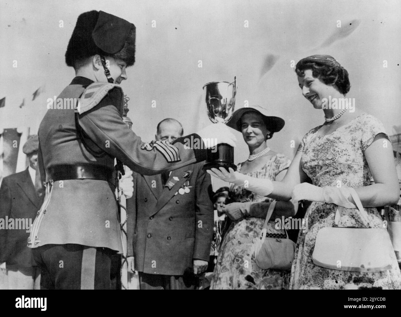 Princess Makes Presentation -- Princess Alexandra, watches by her ...