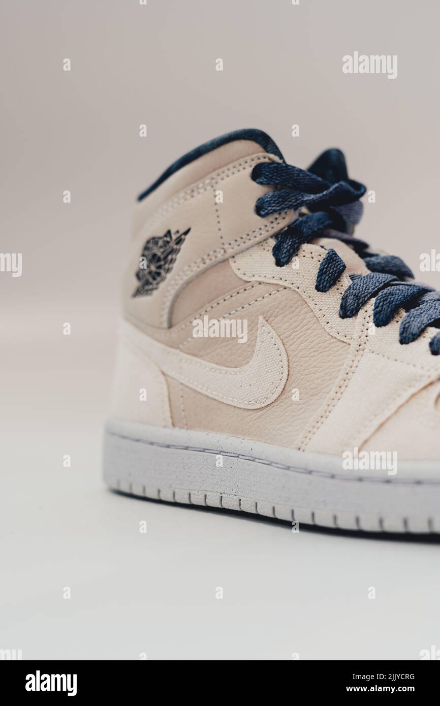 A vertical shot of a bright Nike Air Jordan 1 High OG sneaker Stock ...