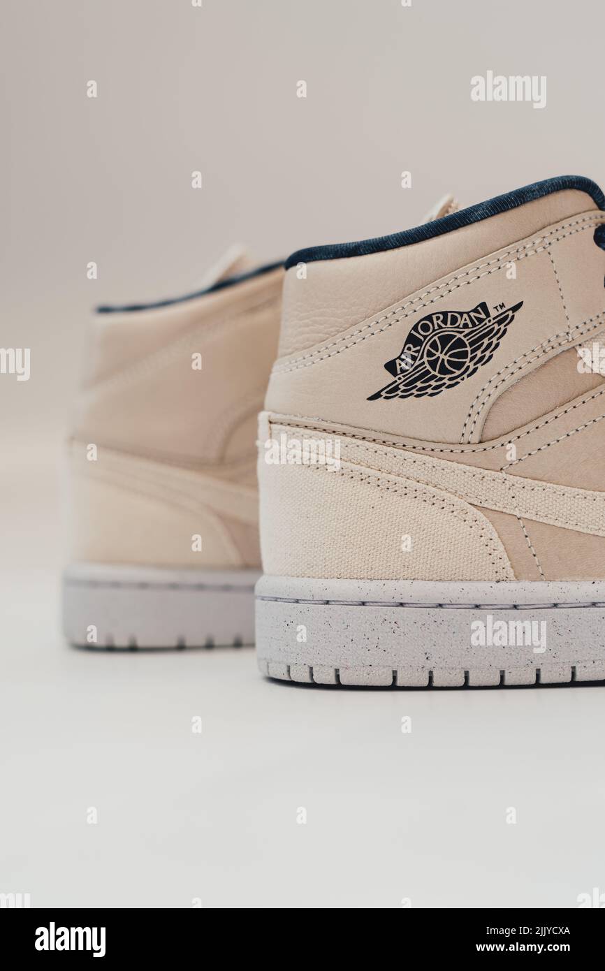 A vertical shot of bright Nike Air Jordan 1 high OG sneakers Stock ...