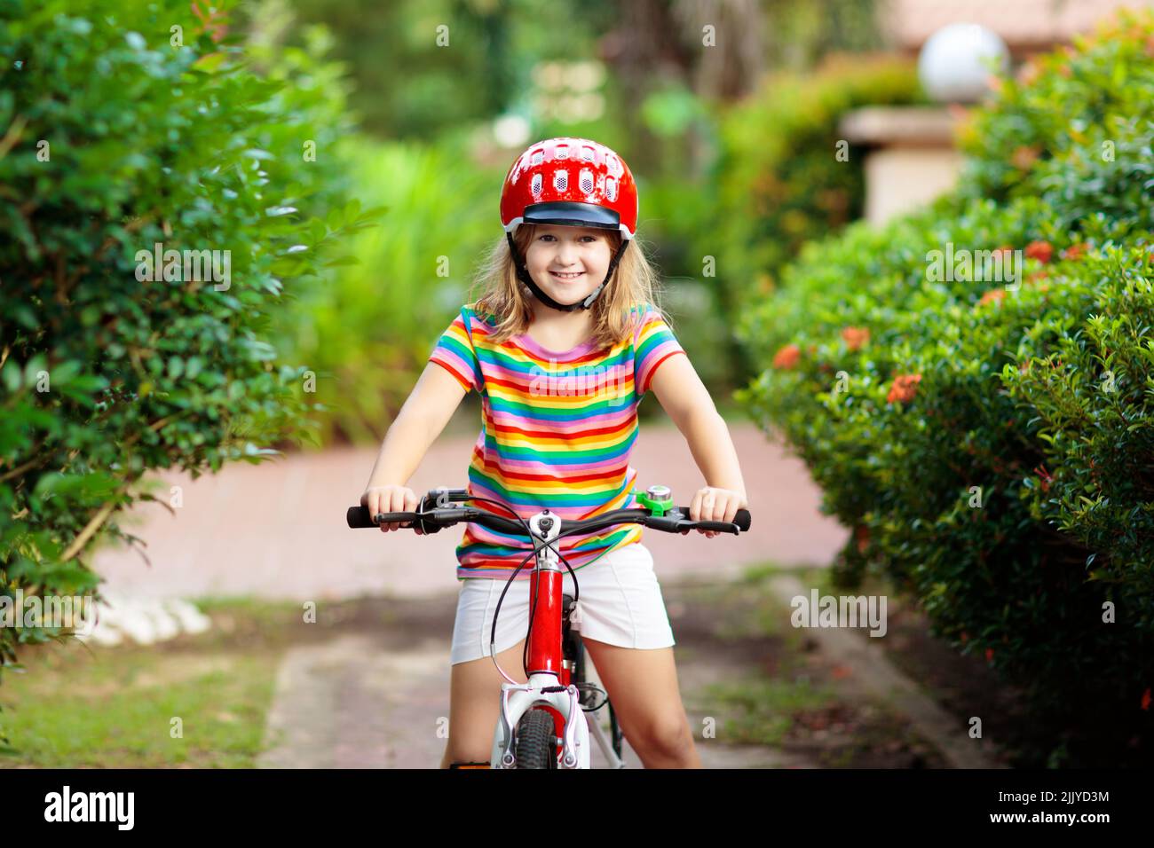 Children going school bicycle in hi-res stock photography and images ...